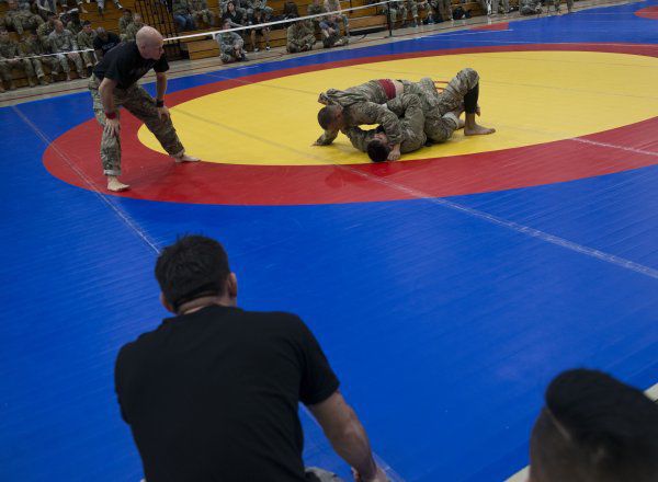 Contestants in the combatives tournament at Fort Bragg say 'you have to ...