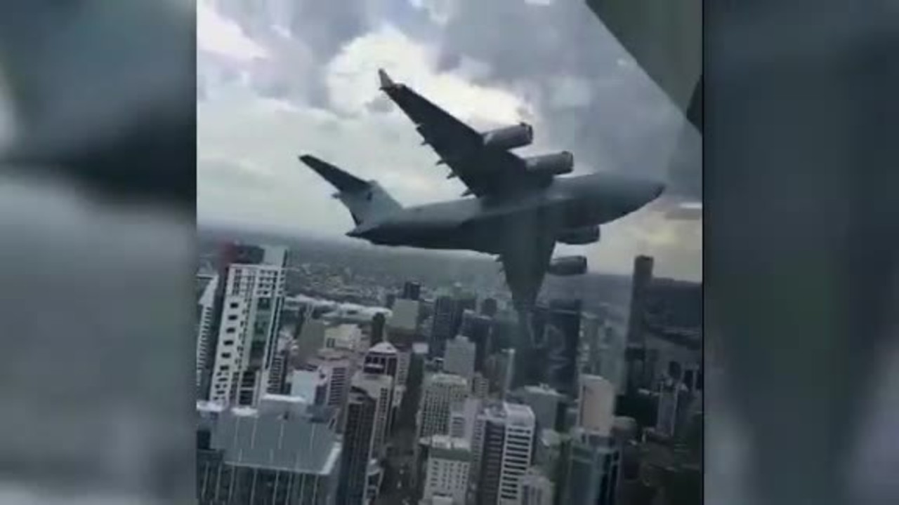 Whoa! Video shows low-flying military plane close to building | RallyPoint