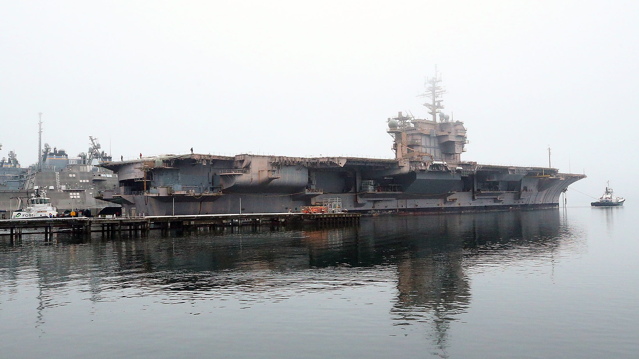 'A whirlwind of emotions:' USS Kitty Hawk aircraft carrier pulls into ...