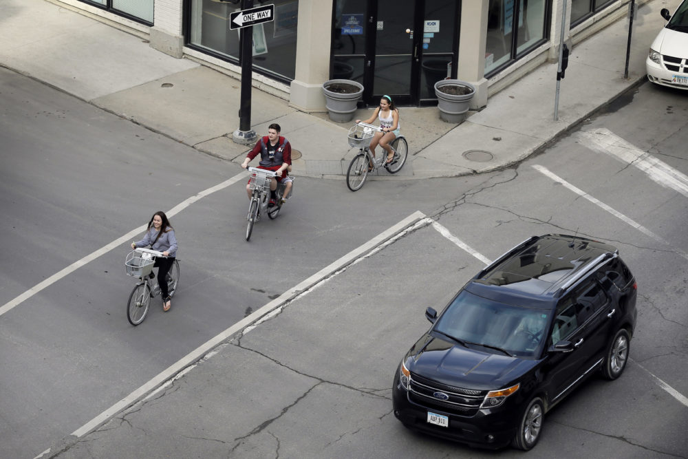 Should cyclists hug the curb or ride in the car lane? | RallyPoint