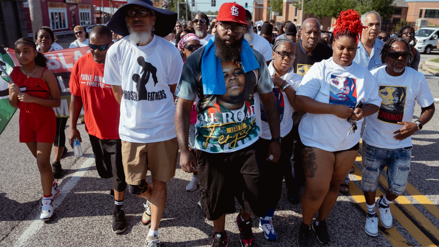 Photos: Family of Michael Brown Jr. marches on Ferguson 10 years later ...